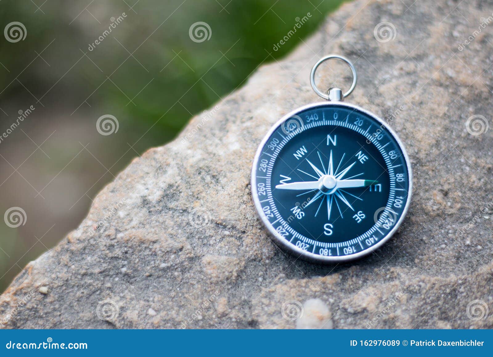 Adventure: Compass is Lying on the Floor, Showing the Direction Stock ...