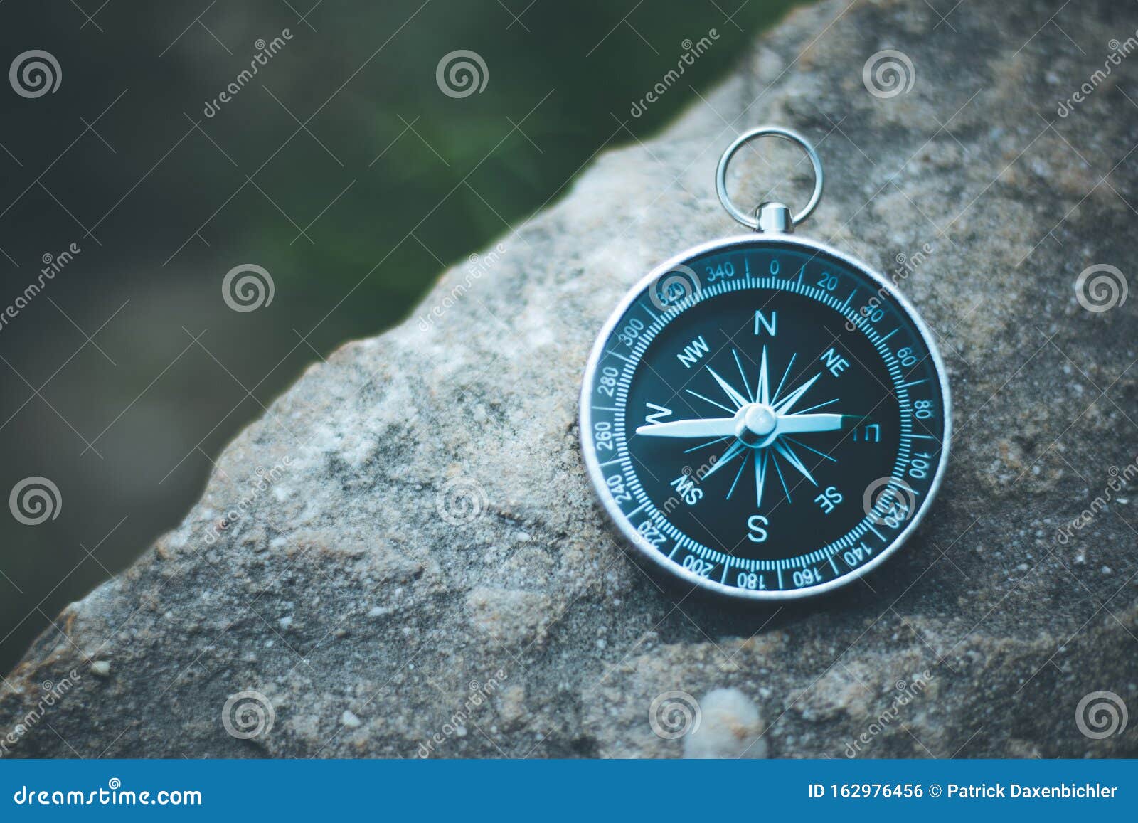 Adventure: Compass is Lying on the Floor, Showing the Direction Stock ...