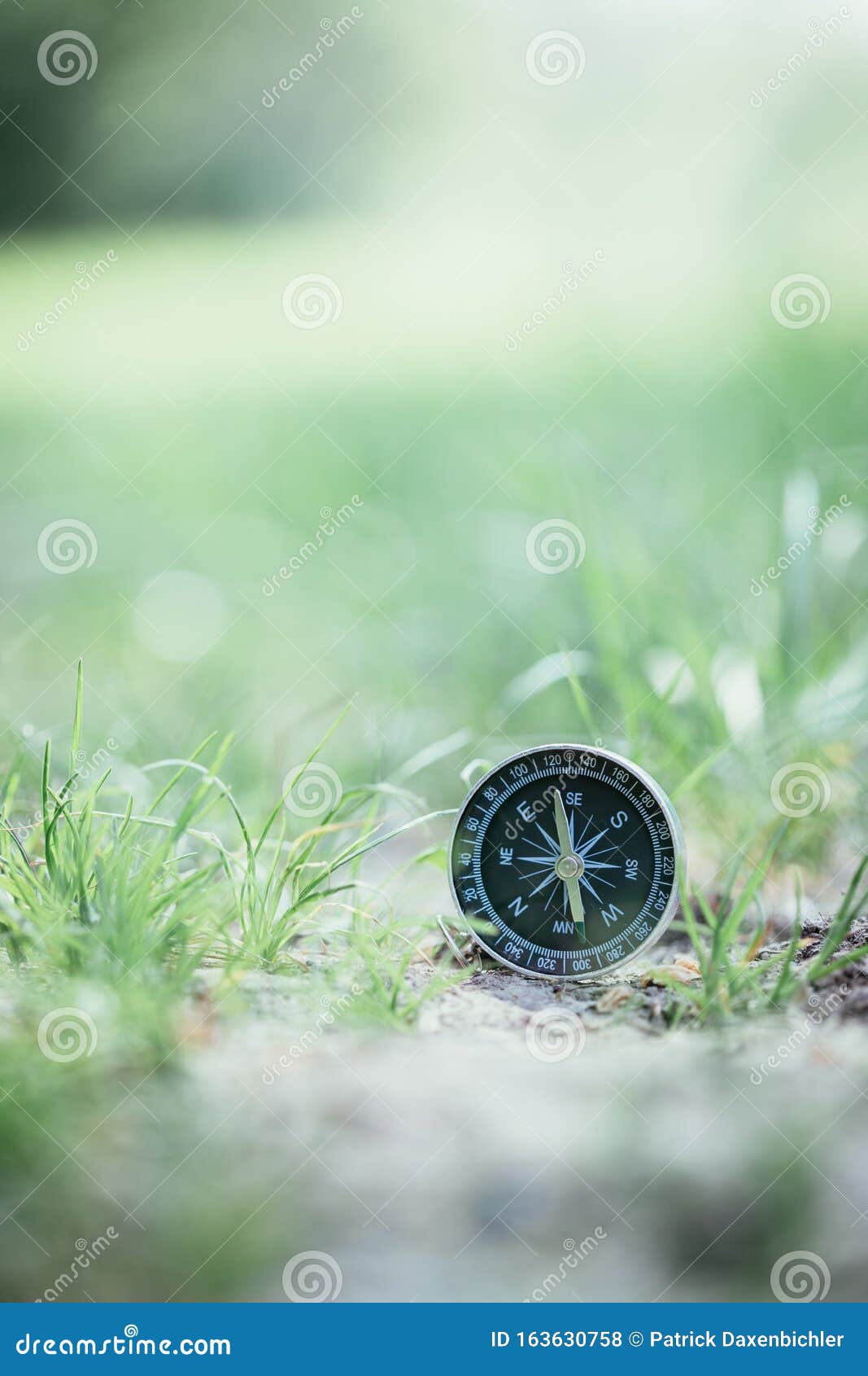 Adventure: Compass is Lying on the Floor, Showing the Direction Stock ...