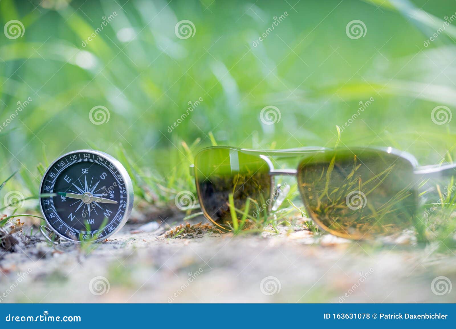 Adventure: Compass is Lying on the Floor, Showing the Direction Stock ...