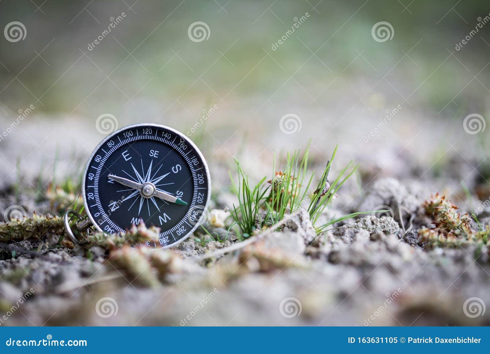 Adventure: Compass is Lying on the Floor, Showing the Direction Stock ...