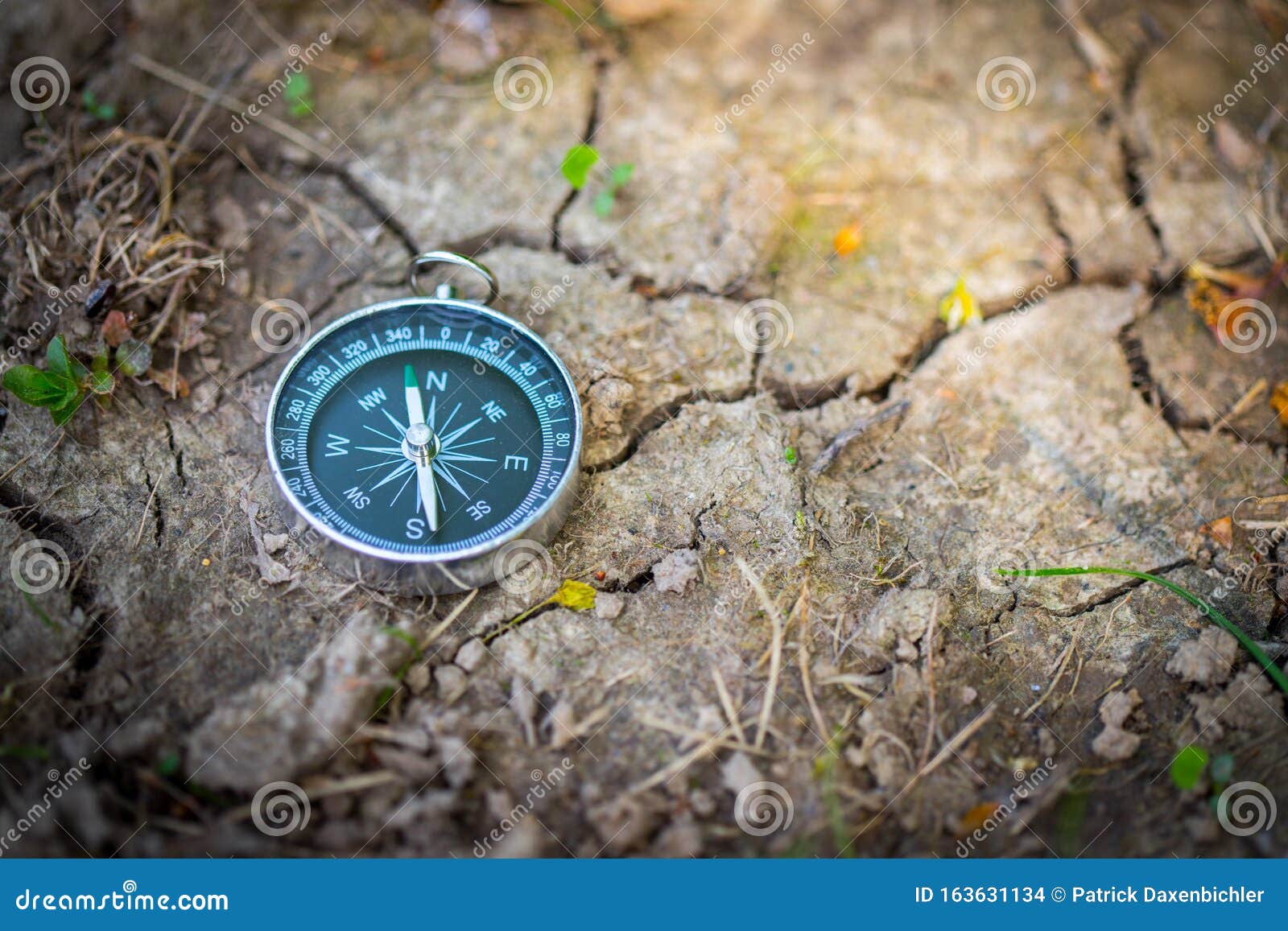 Adventure: Compass is Lying on the Floor, Showing the Direction Stock ...
