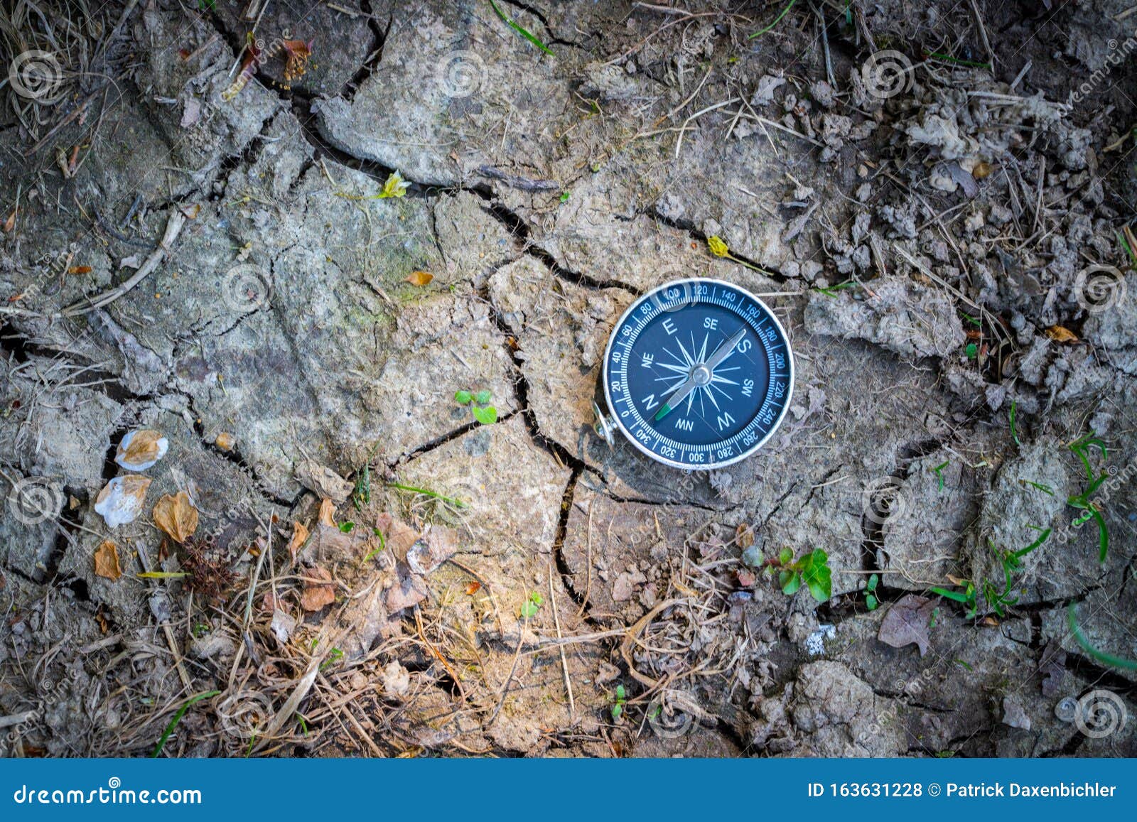 Adventure: Compass is Lying on the Floor, Showing the Direction Stock ...