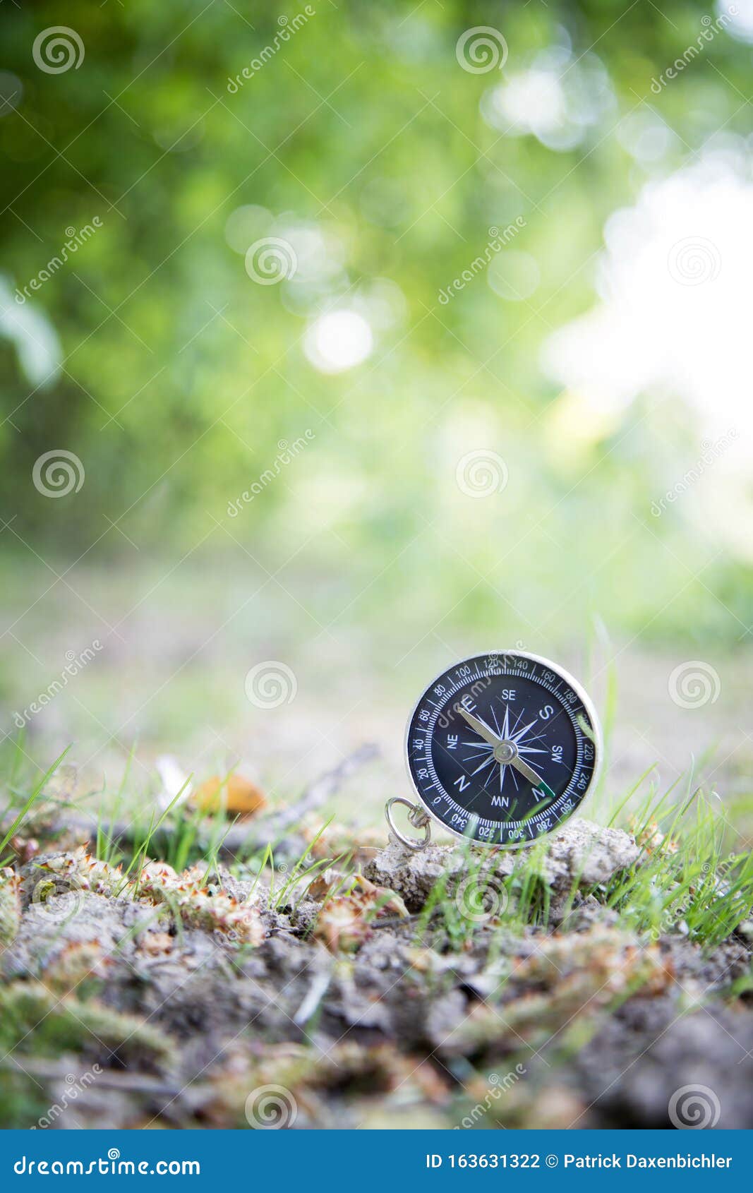 Adventure: Compass is Lying on the Floor, Showing the Direction Stock ...