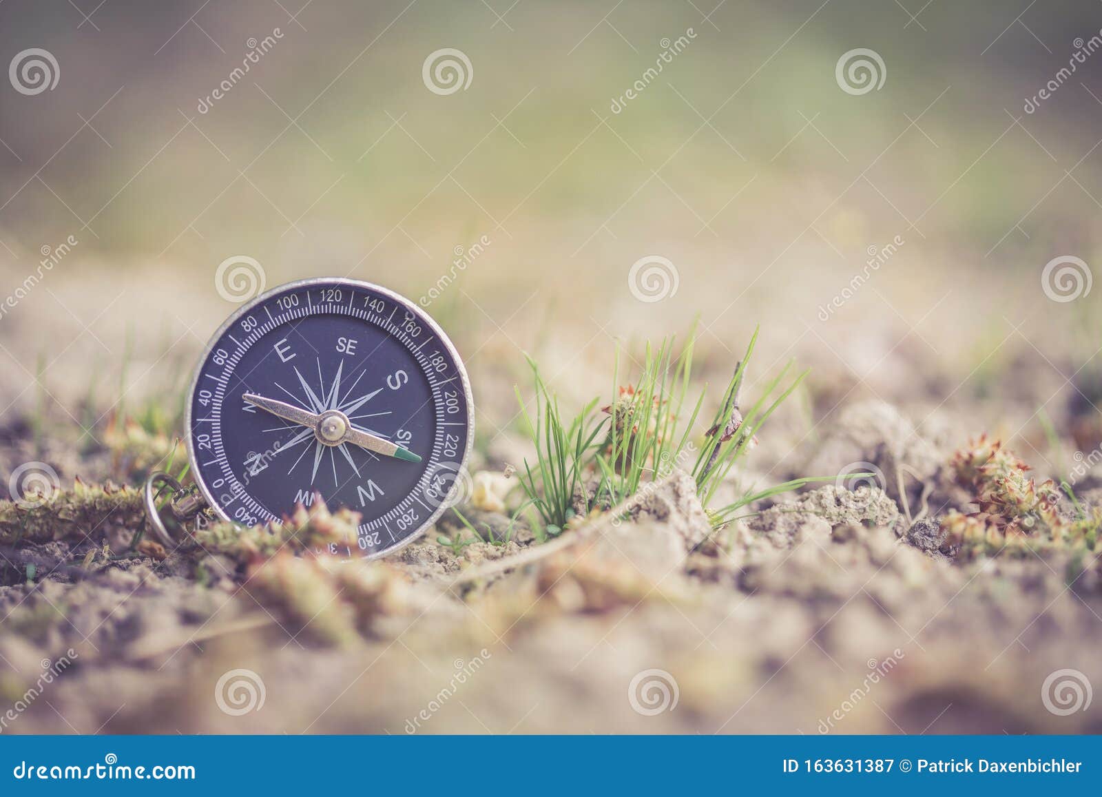 Adventure: Compass is Lying on the Floor, Showing the Direction Stock ...