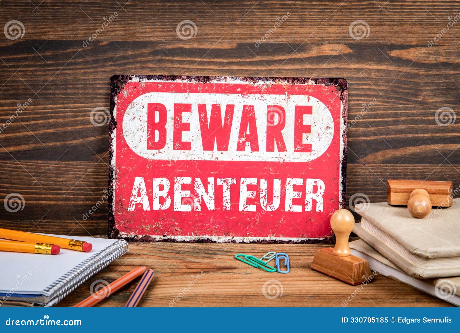 Adventure in German. Beware Sign with Text on a Wooden Texture Office ...