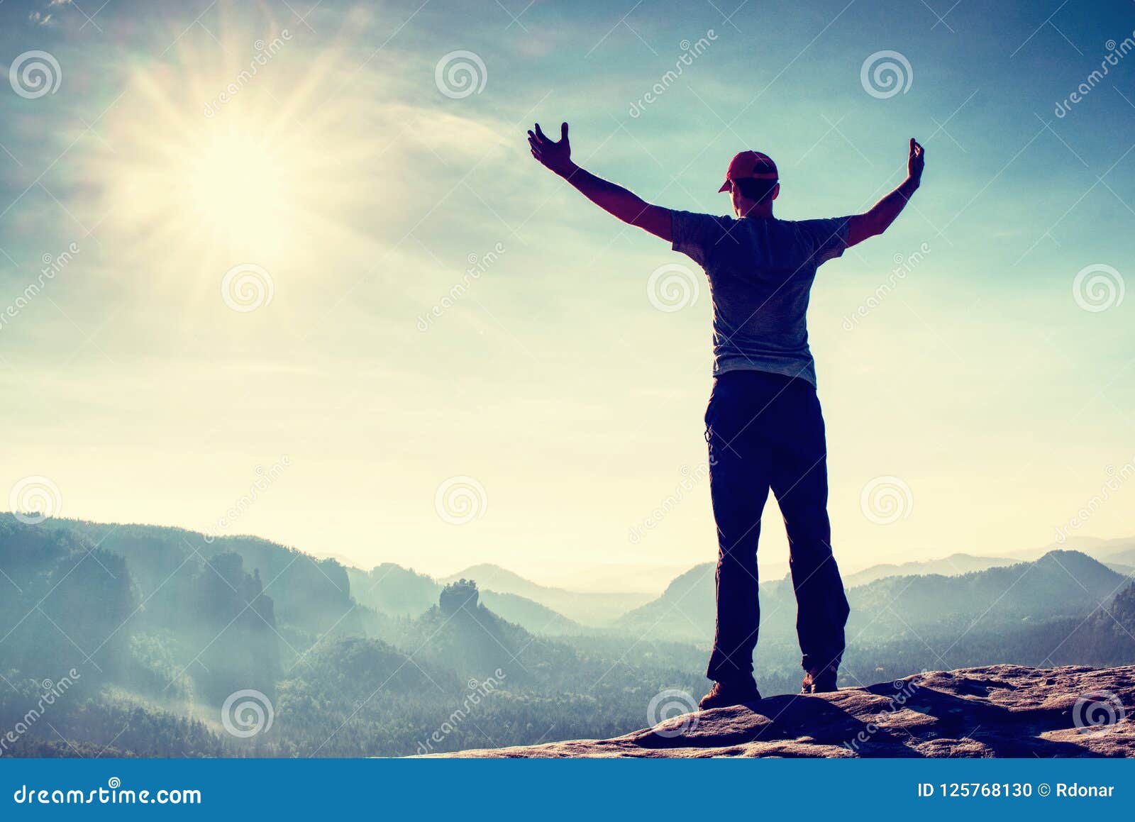Adventure in Mountains. Man Performs Success and Emotions Stock Photo ...