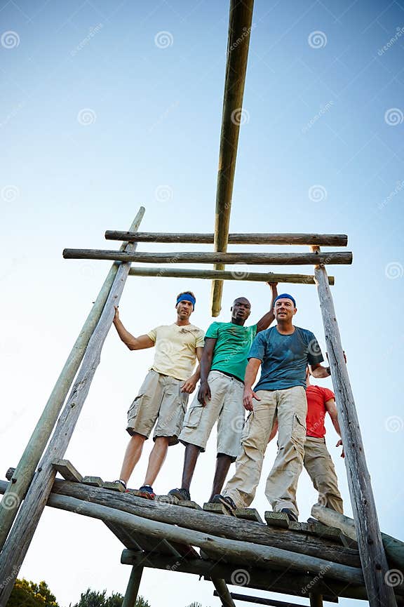 Adventure Time. a Group of Men Going through an Obstacle Course at ...
