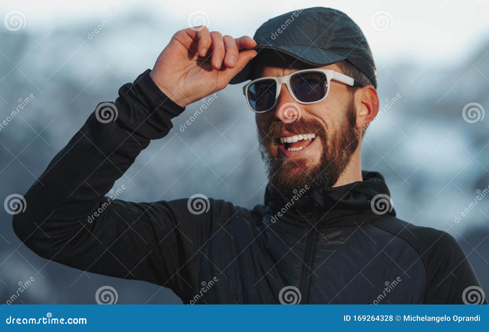 Adventurous Explorer Man with Beard and Glasses Smiling Stock Photo ...