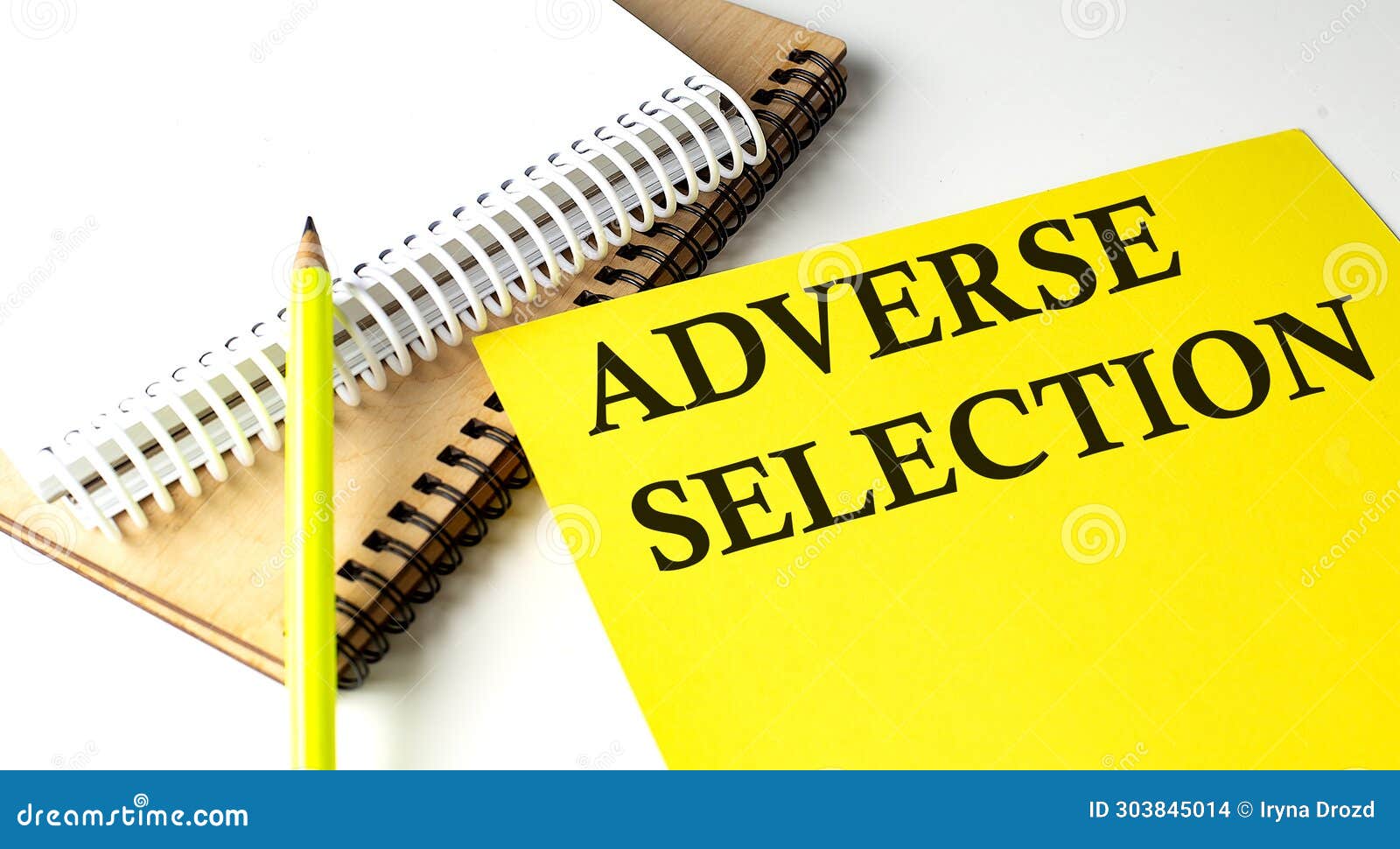 ADVERSE SELECTION Text Written on a Yellow Paper with Notebook Stock ...
