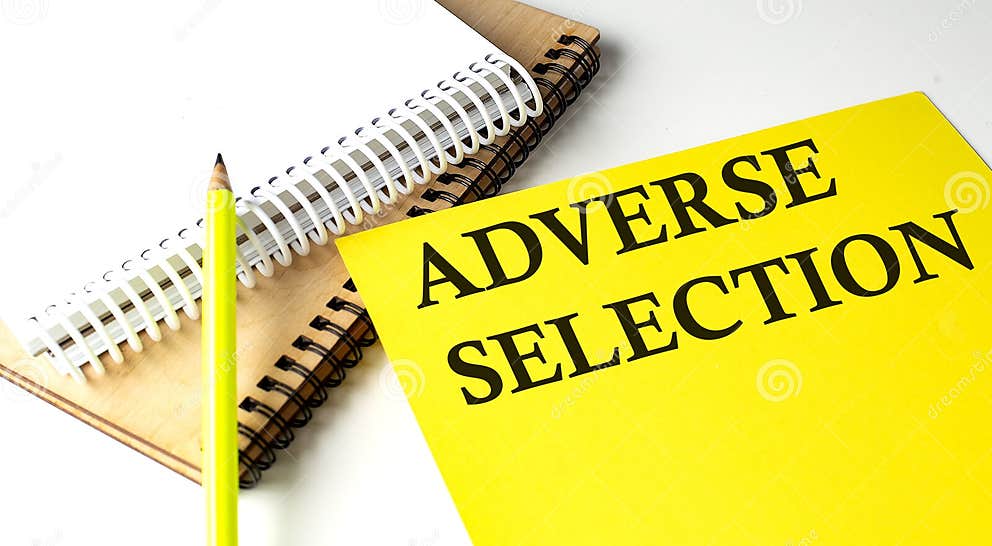 ADVERSE SELECTION Text Written on a Yellow Paper with Notebook Stock ...