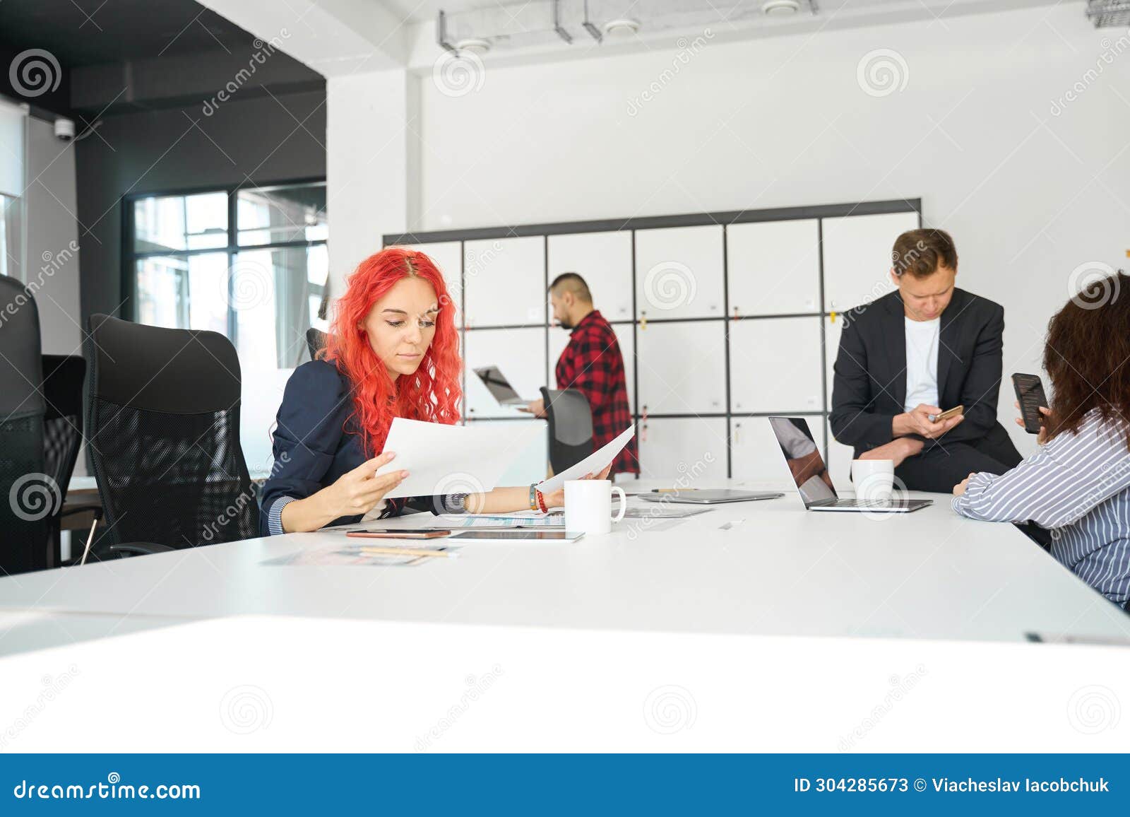 Advertising Agency Staff Doing Their Work in Comfortable Bright Office ...