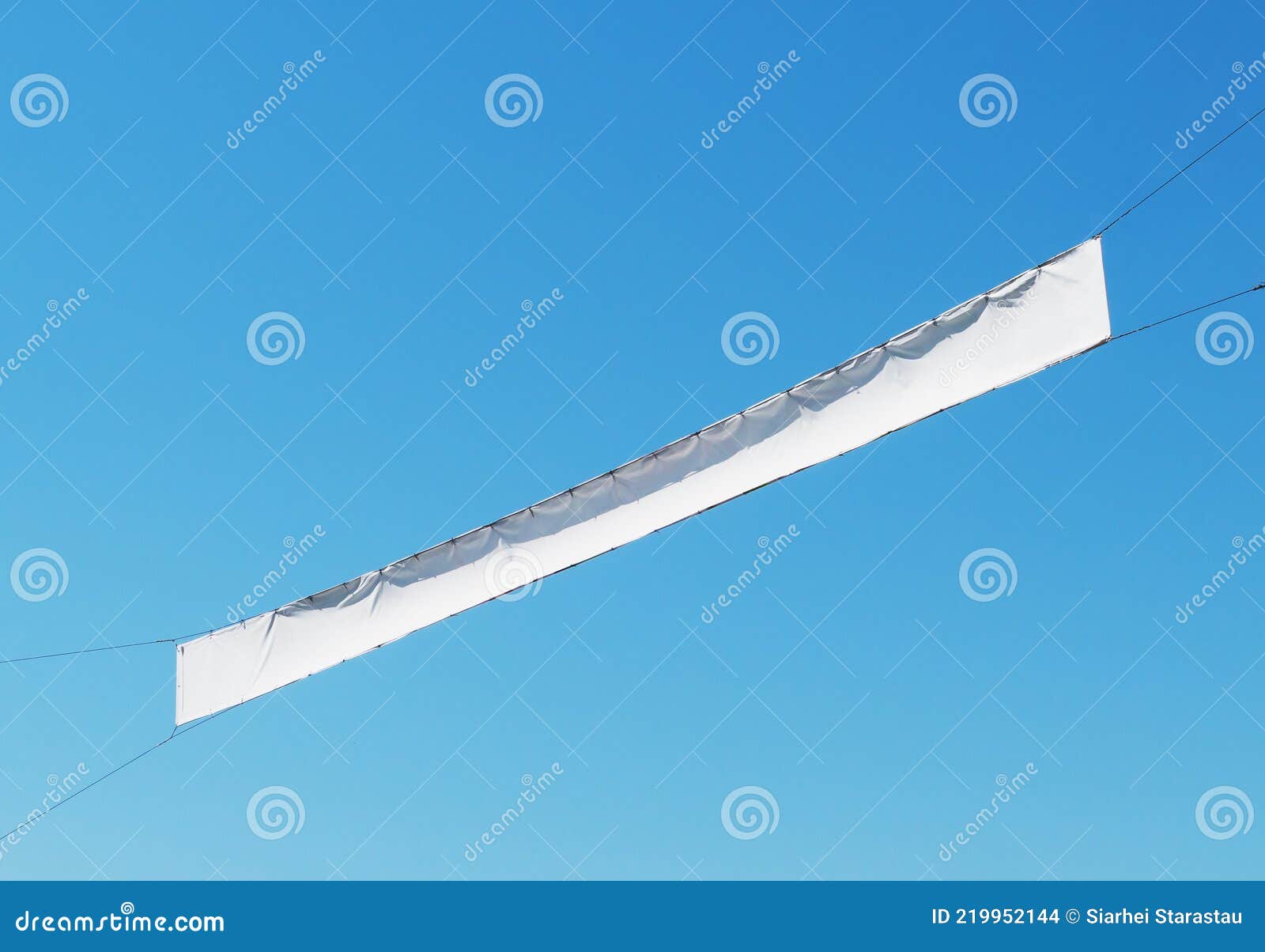 An Advertising Banner Drawn Across the Road Stock Photo - Image of page ...