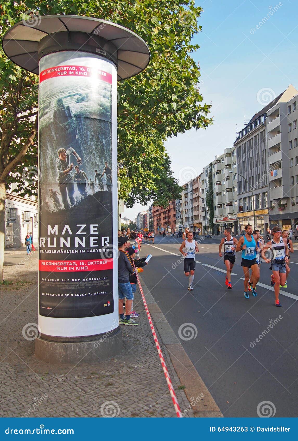 Advertising Column and Runners at Berlin Marathon 2014 Editorial Stock ...