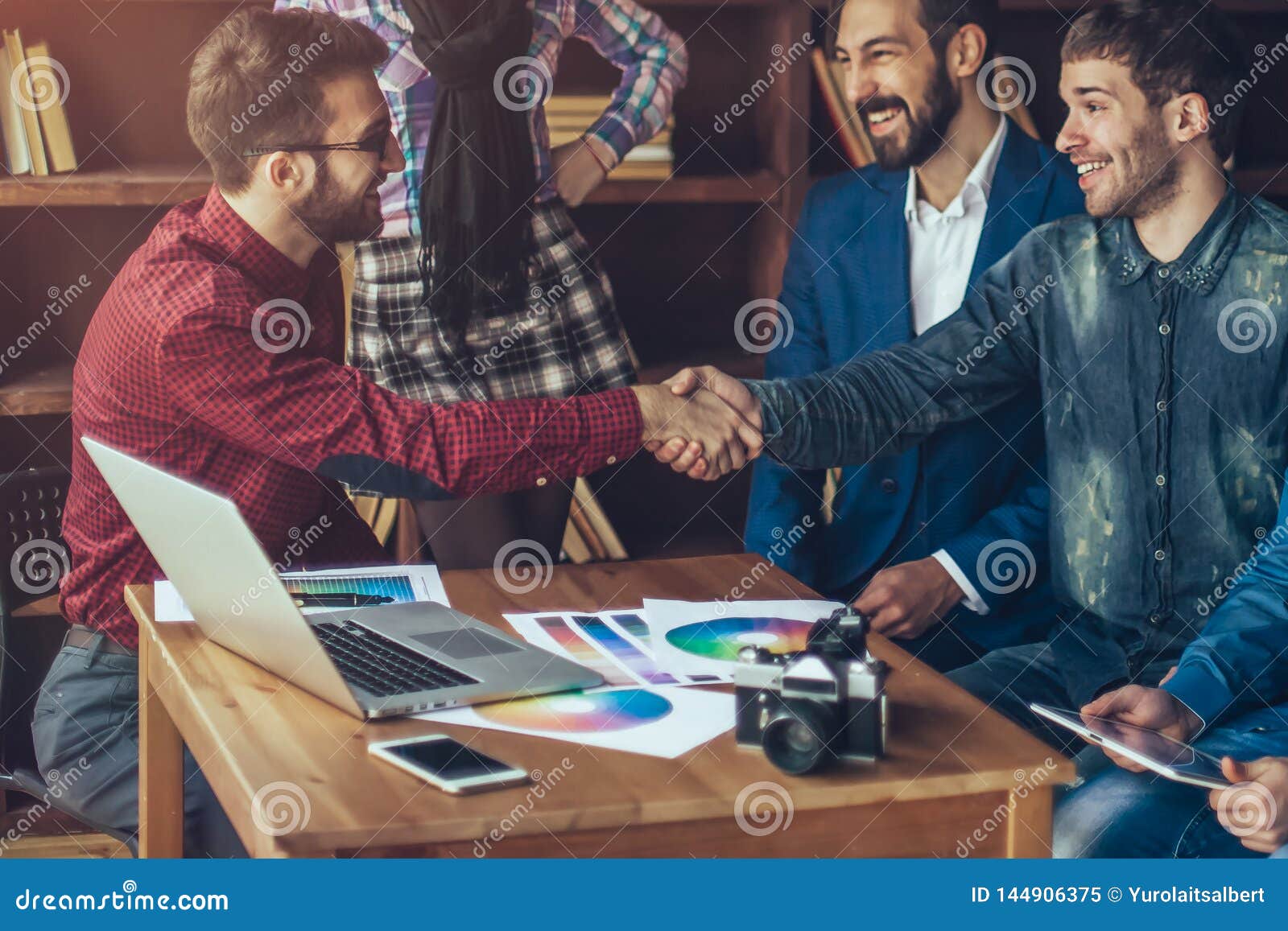 Advertising Manager with a Handshake Greets the Customer Stock Image ...