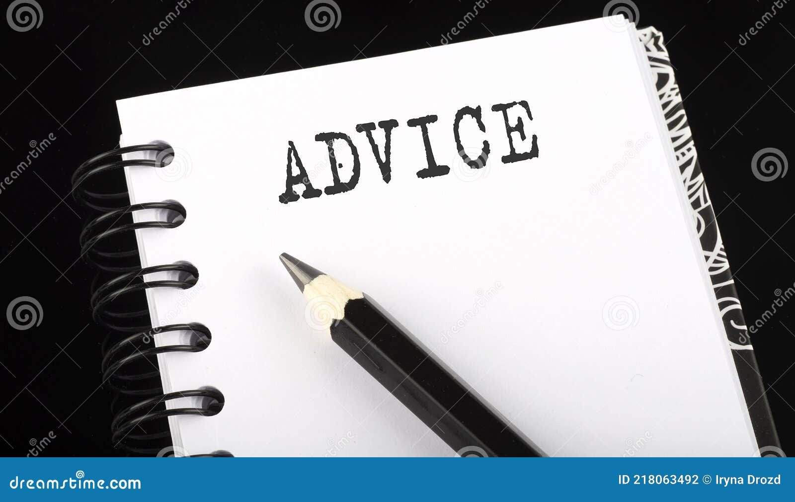 ADVICE Written Text in Small Notebook on a Black Background Stock ...