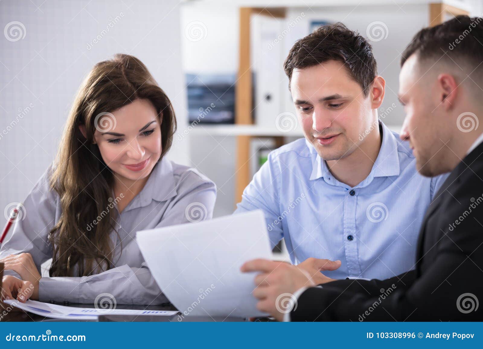 Advisor Discussing with Couple Stock Photo - Image of lady, corporate ...