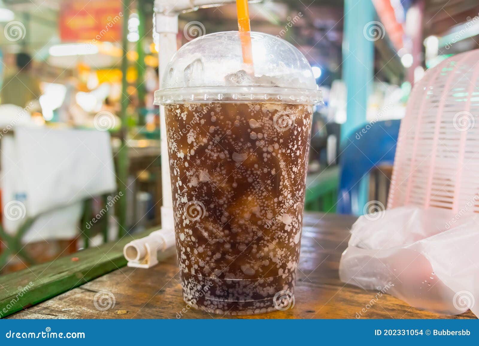 Aerated Soft Drink with Ice in Plastic Glass Stock Photo - Image of ...