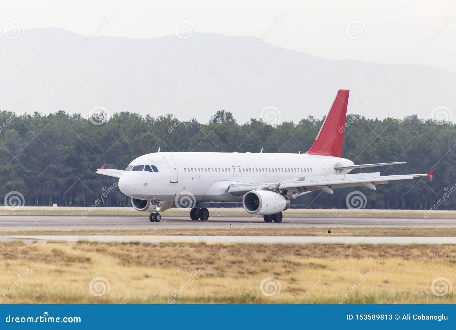 Aereo Passeggeri Che Prepara Per Il Decollo Immagine Stock - Immagine ...