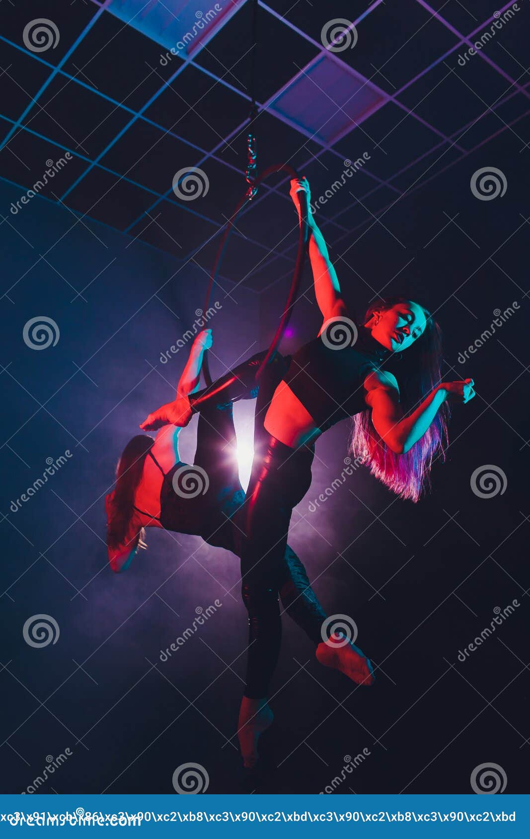 Aerial Acrobat in the Ring. a Two Young Girl Performs the Acrobatic ...