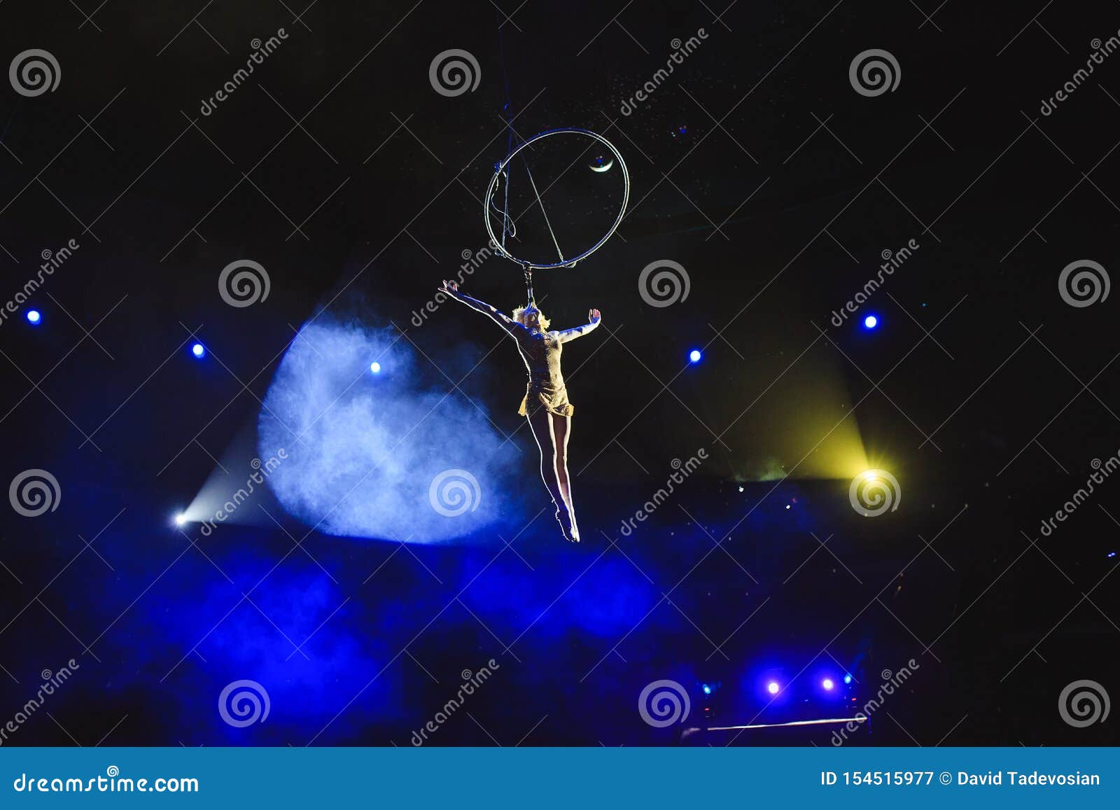 Aerial Acrobat in the Ring. a Young Girl Performs the Acrobatic ...