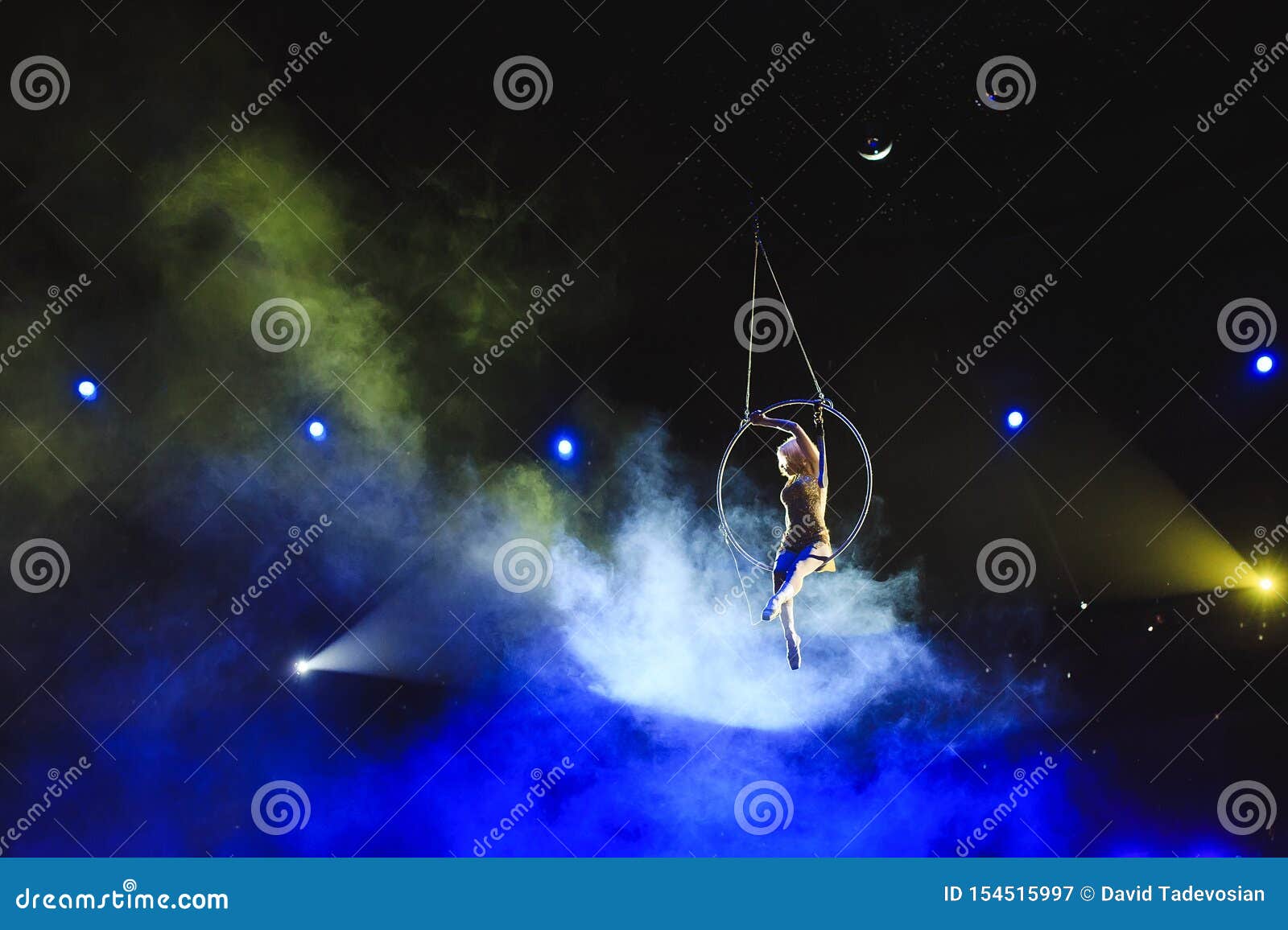 Aerial Acrobat in the Ring. a Young Girl Performs the Acrobatic ...