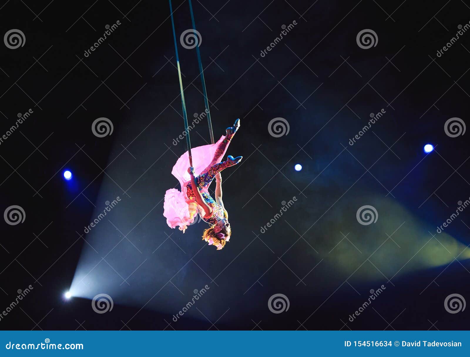 Aerial Acrobat in the Ring. a Young Girl Performs the Acrobatic ...