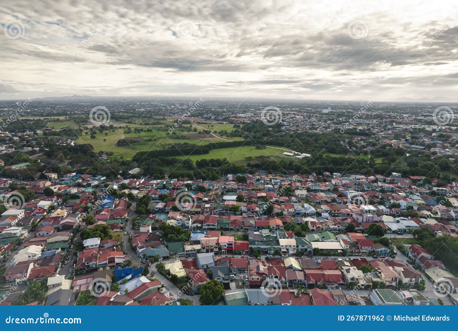 Aerial of BF Resort Las Pinas and a Plot of Private Undeveloped Land in ...