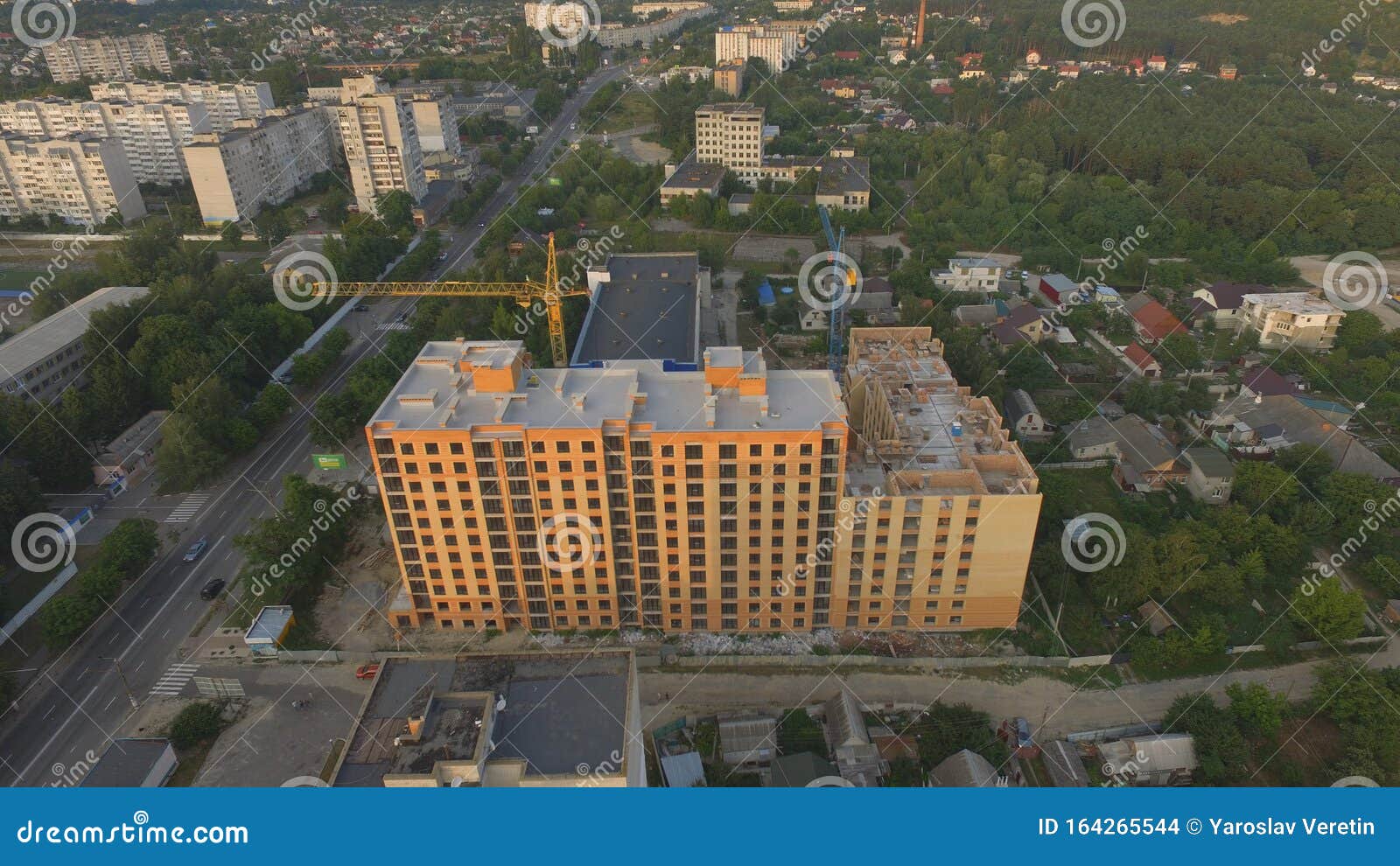 Aerial Building Process of Construction Site. Engineers Crane and City ...