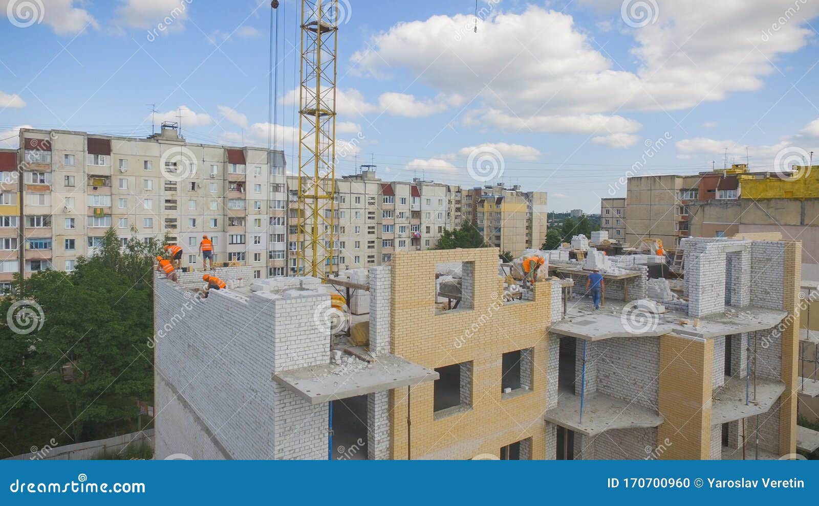 Aerial Building Process of Construction Site. Engineers Crane and City ...