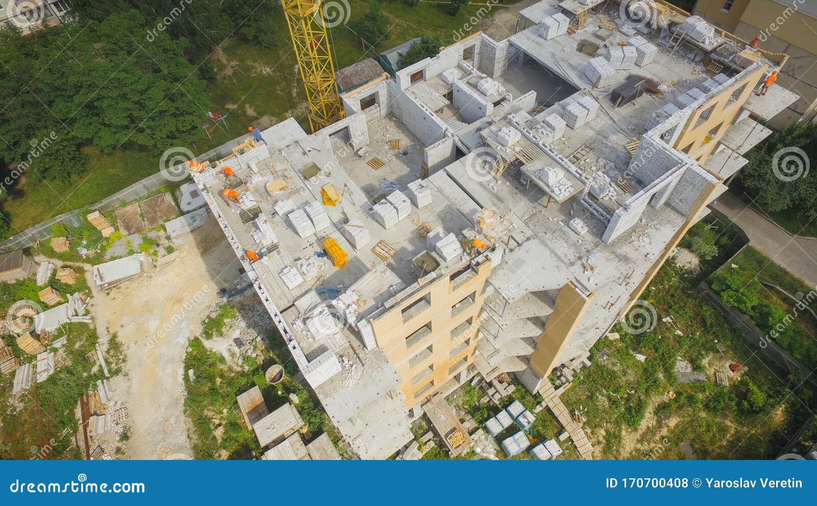 Aerial Building Process of Construction Site. Engineers Crane and City ...