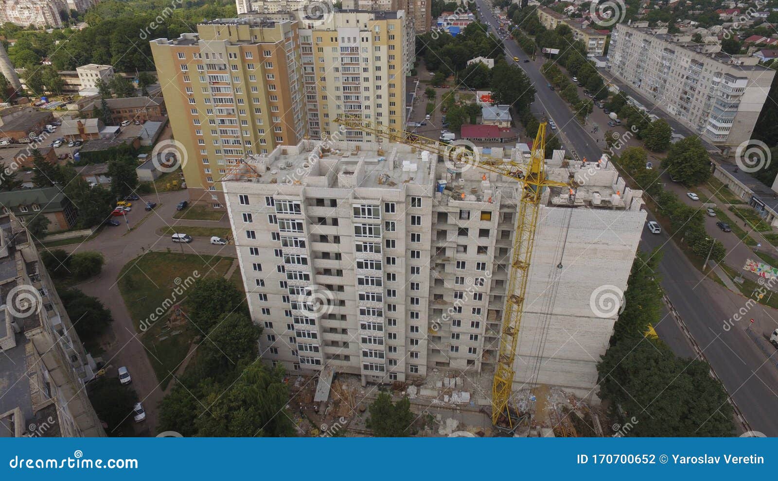 Aerial Building Process of Construction Site. Engineers Crane and City ...