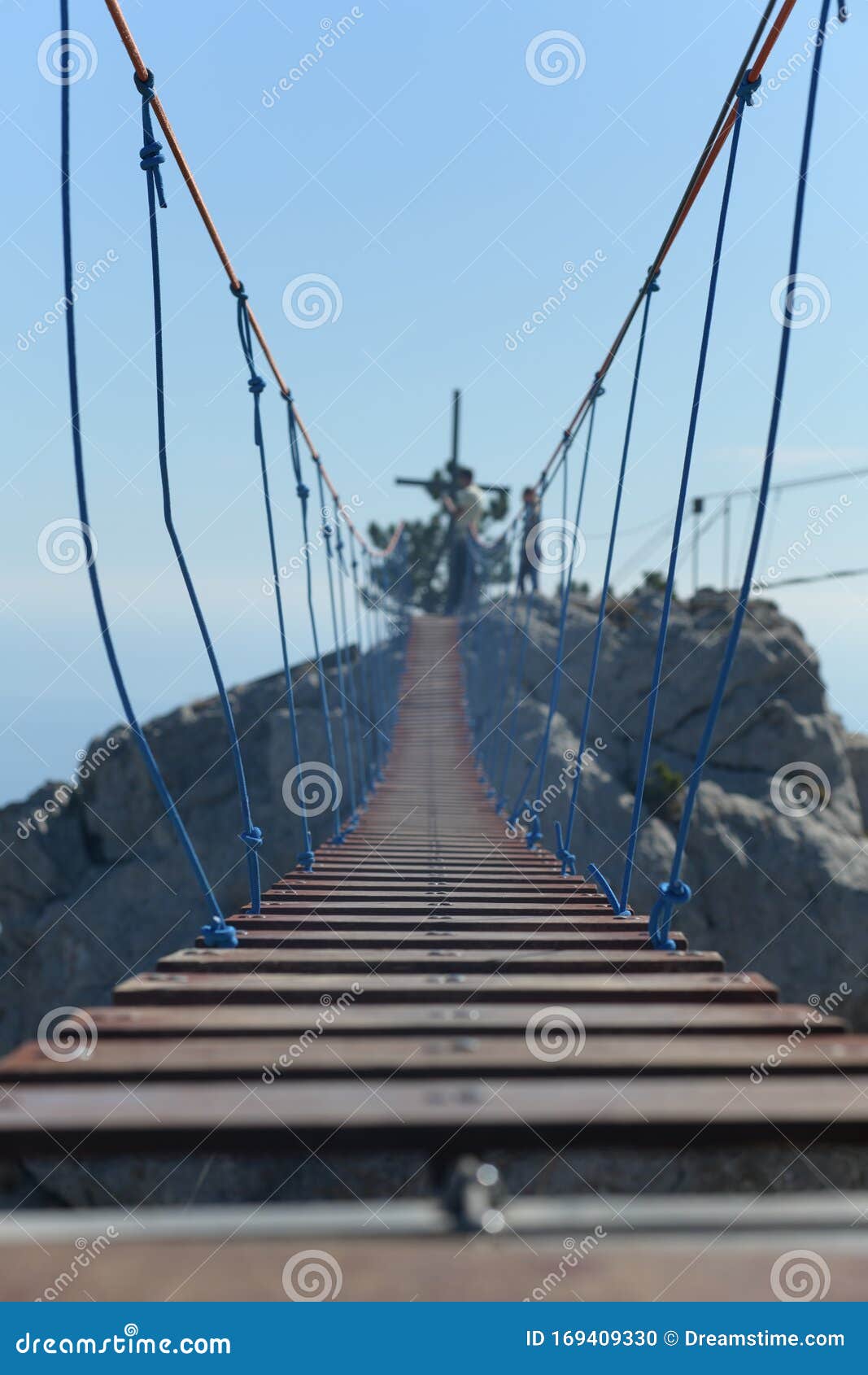 An Aerial Cable-stayed Bridge Hanging Over an Invisible Chasm, with an ...