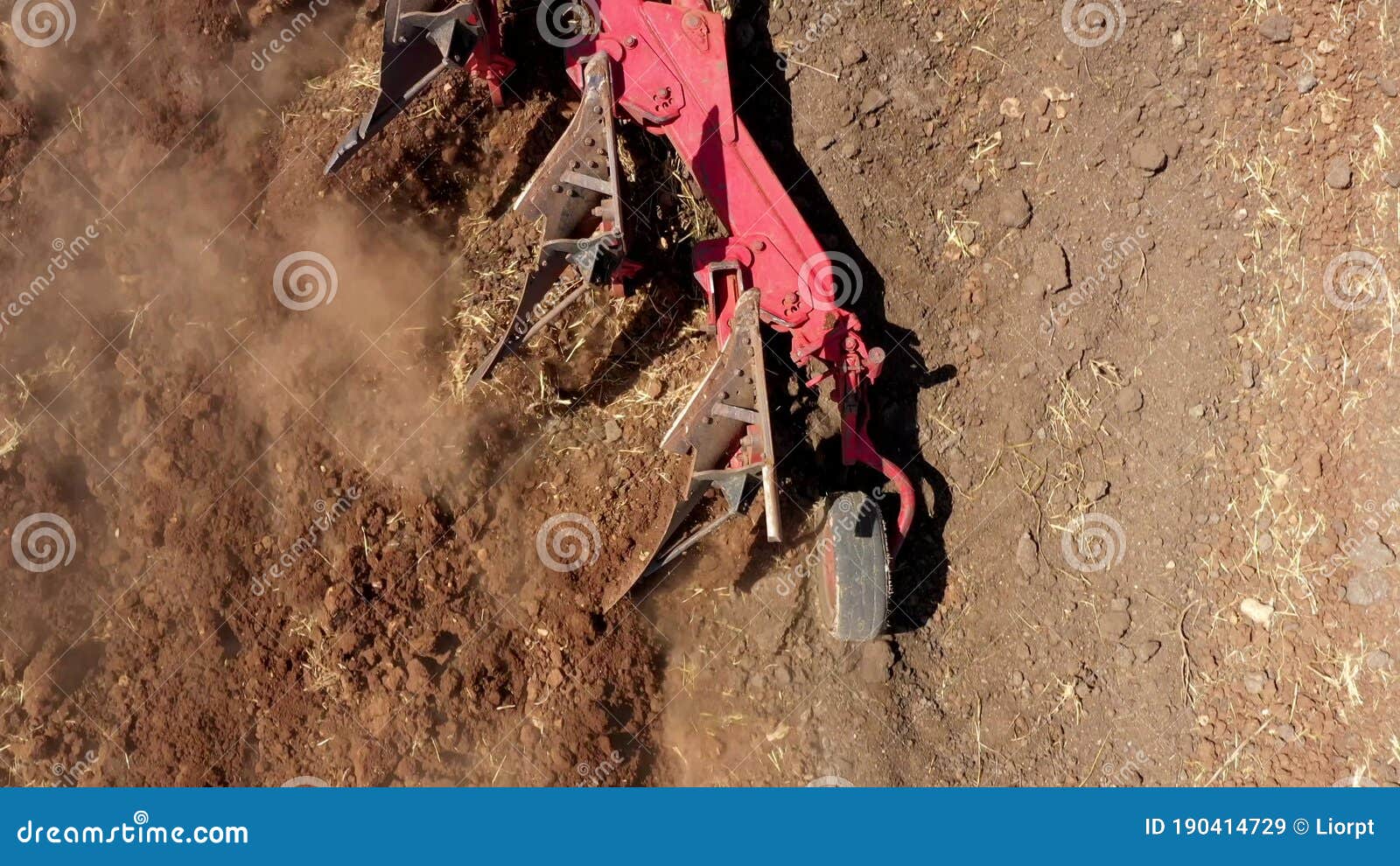 Aerial Shot of a Plow Processing a Dry Soil Field. Stock Video - Video ...