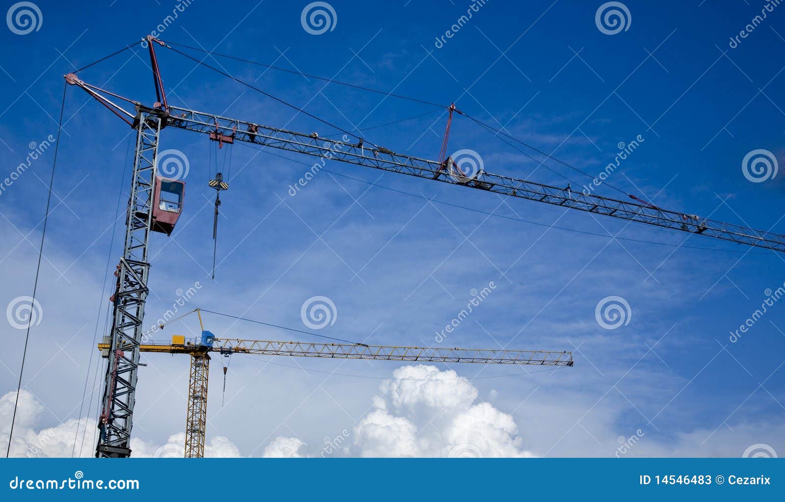 Aerial cranes and blue sky stock image. Image of angle - 14546483
