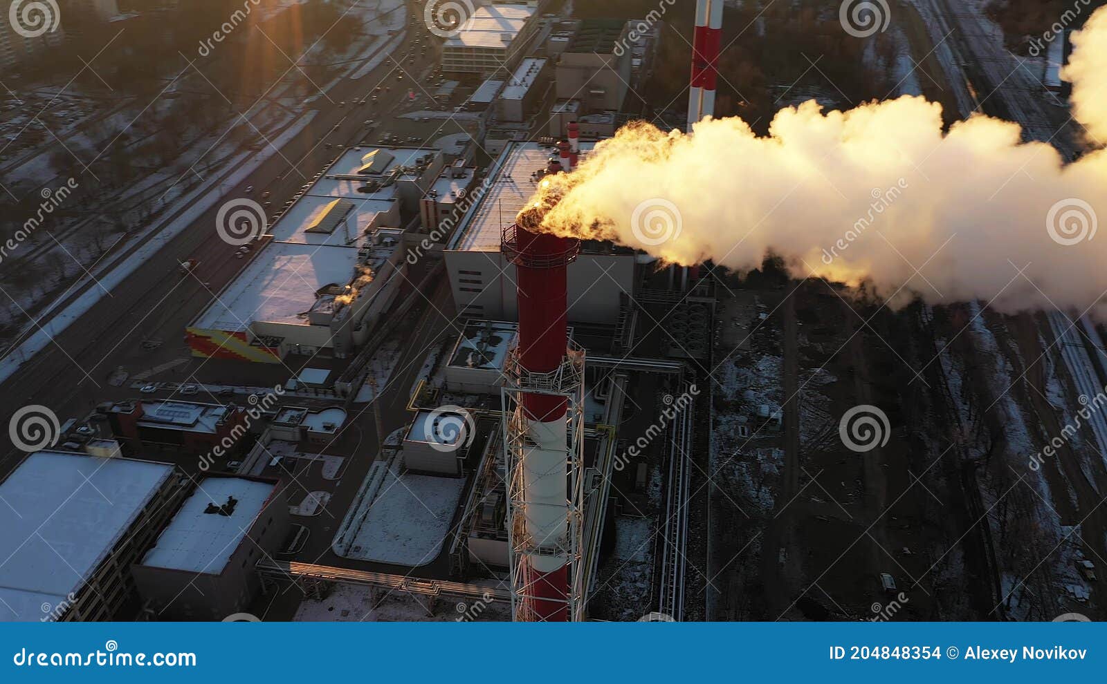 Aerial Down View of an Air Polluting Industrial Smoke Stack in the City ...