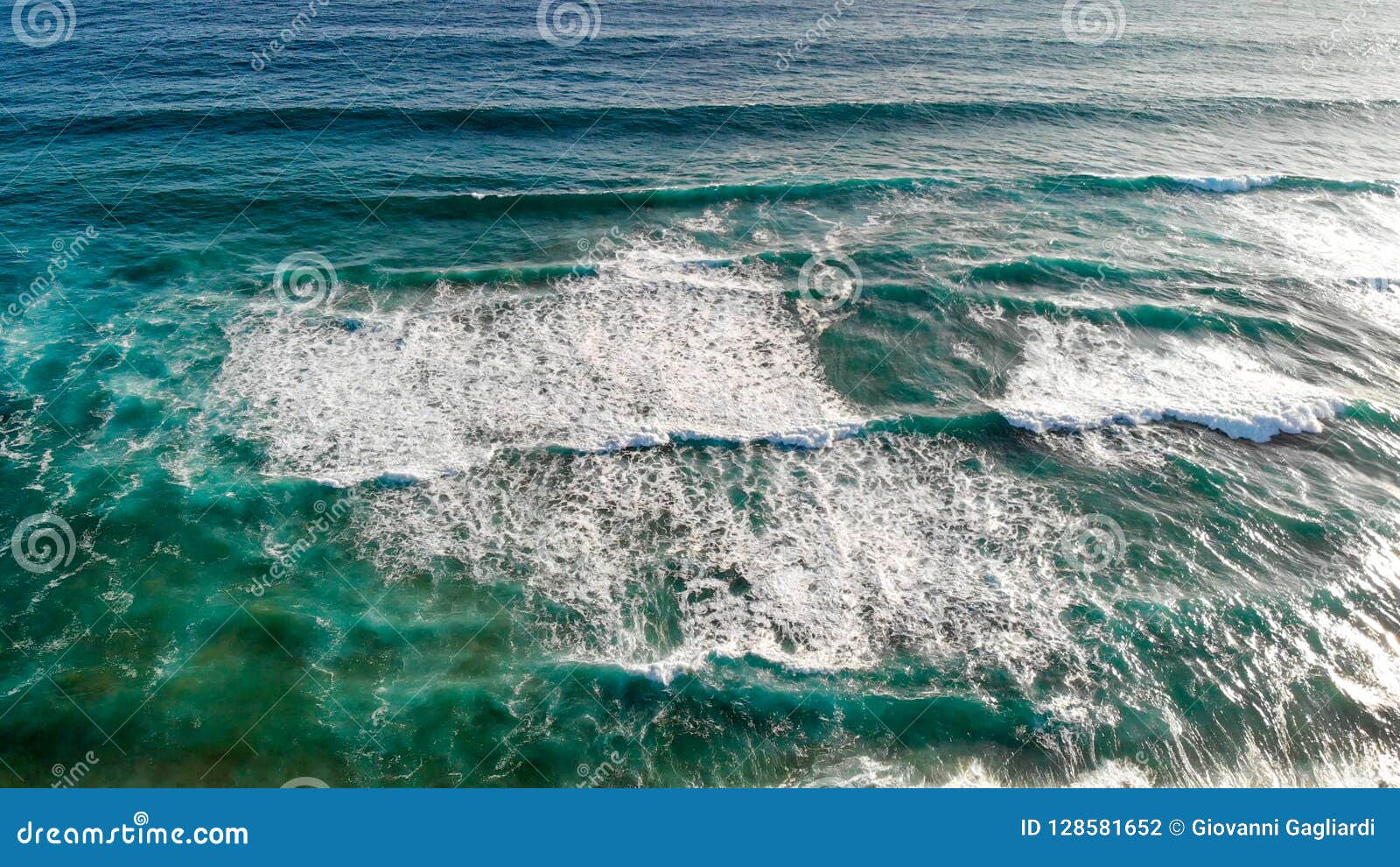 Aerial Downward View of Sea Waves on a Beautiful Sunset Stock Photo ...