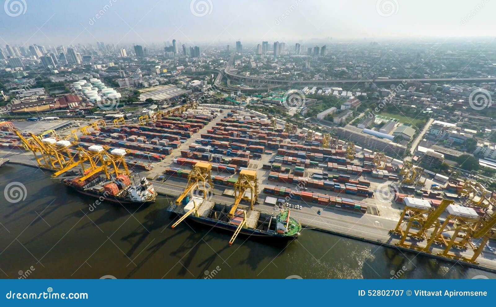 Aerial Image of Cargo Ships at Seaport with City View Stock Image ...