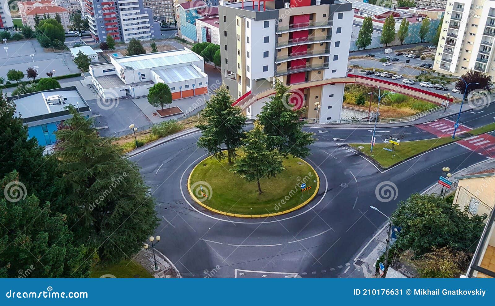 An Aerial Image of a Traffic Island with Circles Around the Outside ...