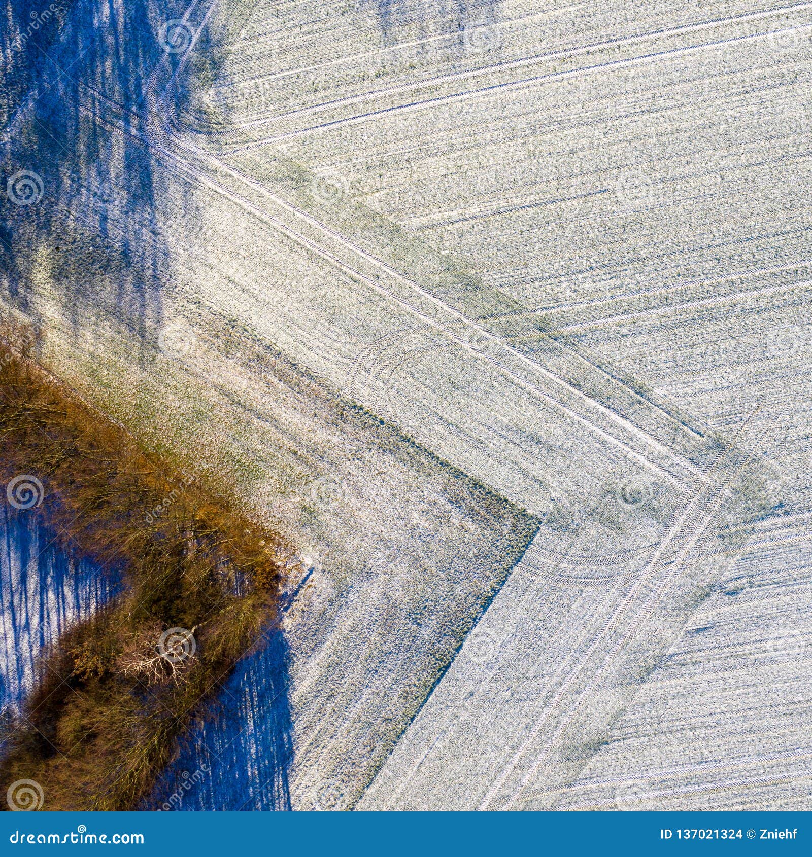 Aerial Photograph of a Field with a Thin Layer of Snow Carefully ...