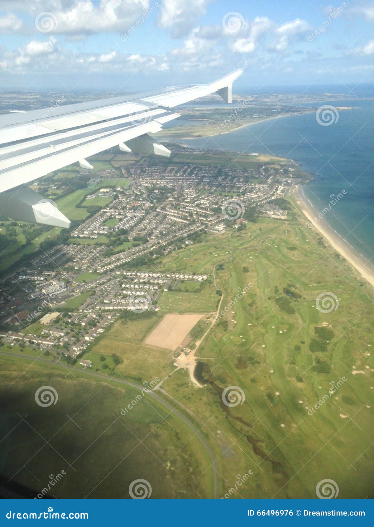 Aerial Plane Flying Over Land Stock Photo - Image of ocean, flying ...