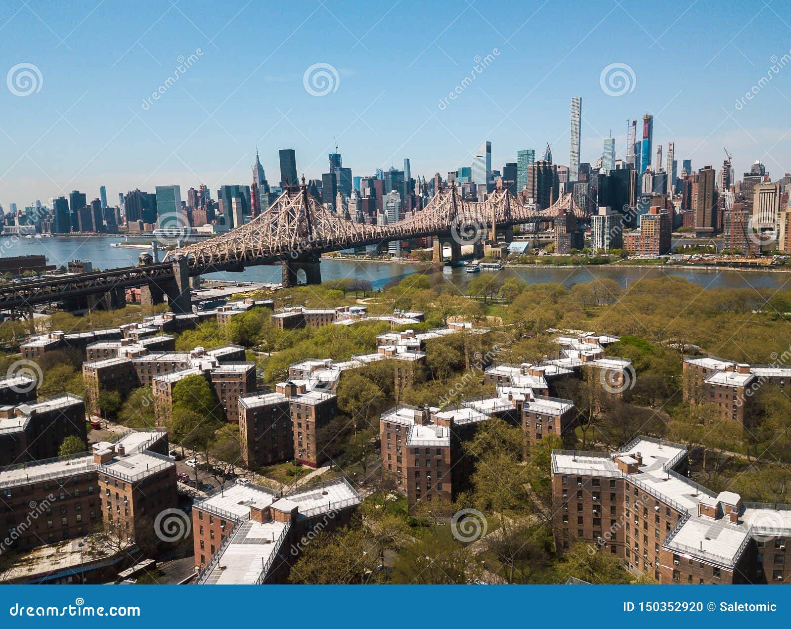 Aerial of Queensborough Bridge and Downtown Manhattan Stock Photo ...