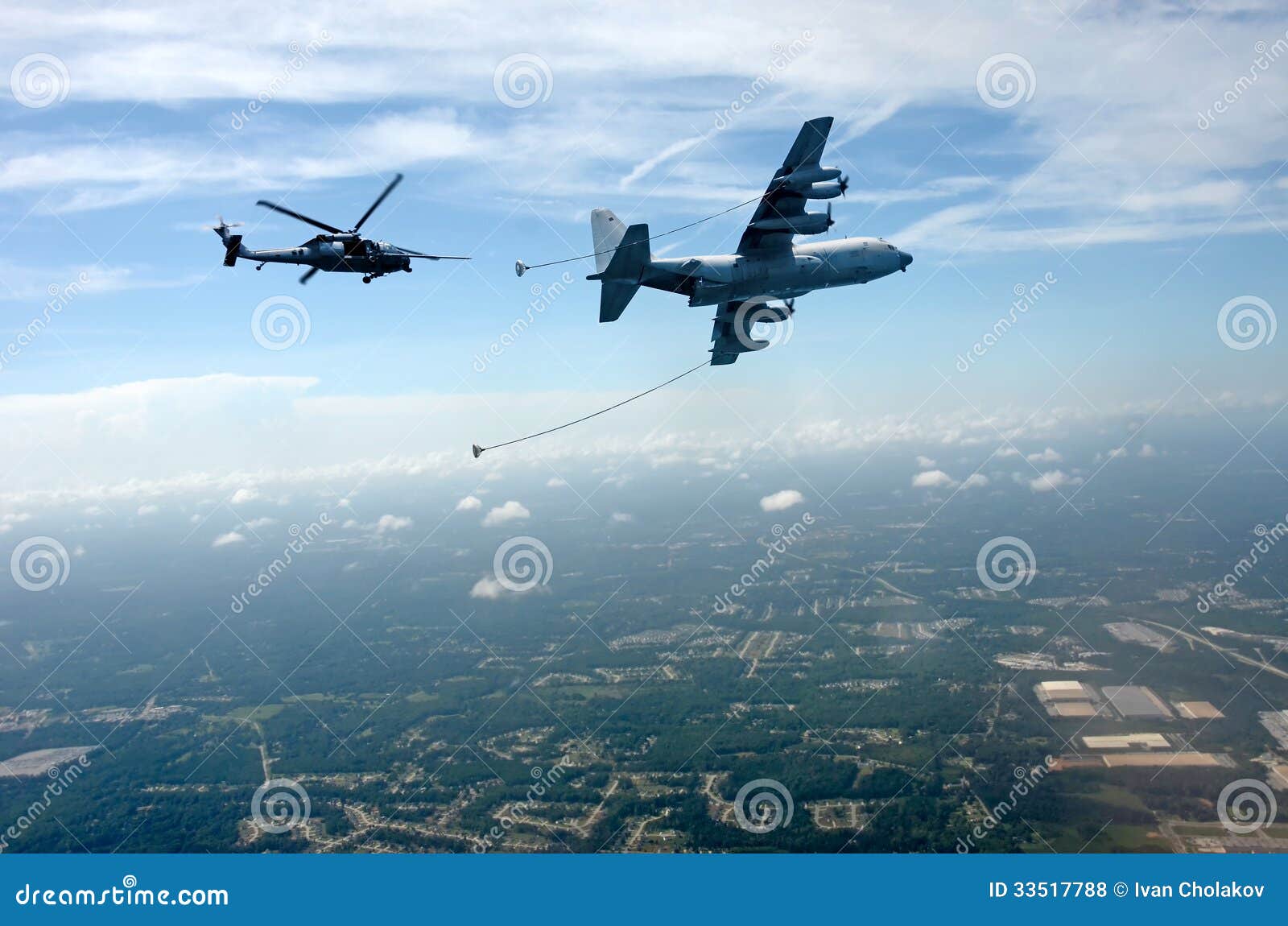 Aerial Refueling of Helicopter Stock Photo - Image of chopper, midair ...