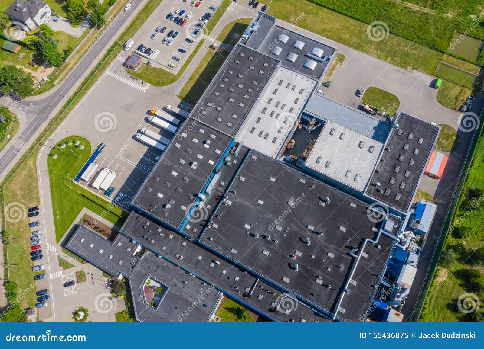 Aerial Shot of Industrial Loading Area Where Many Trucks are Unloading ...