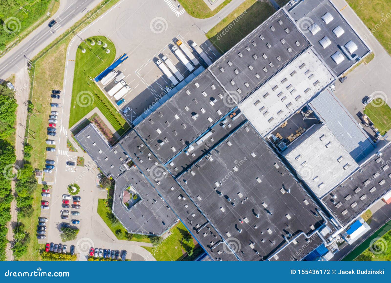 Aerial Shot of Industrial Loading Area Where Many Trucks are Unloading ...