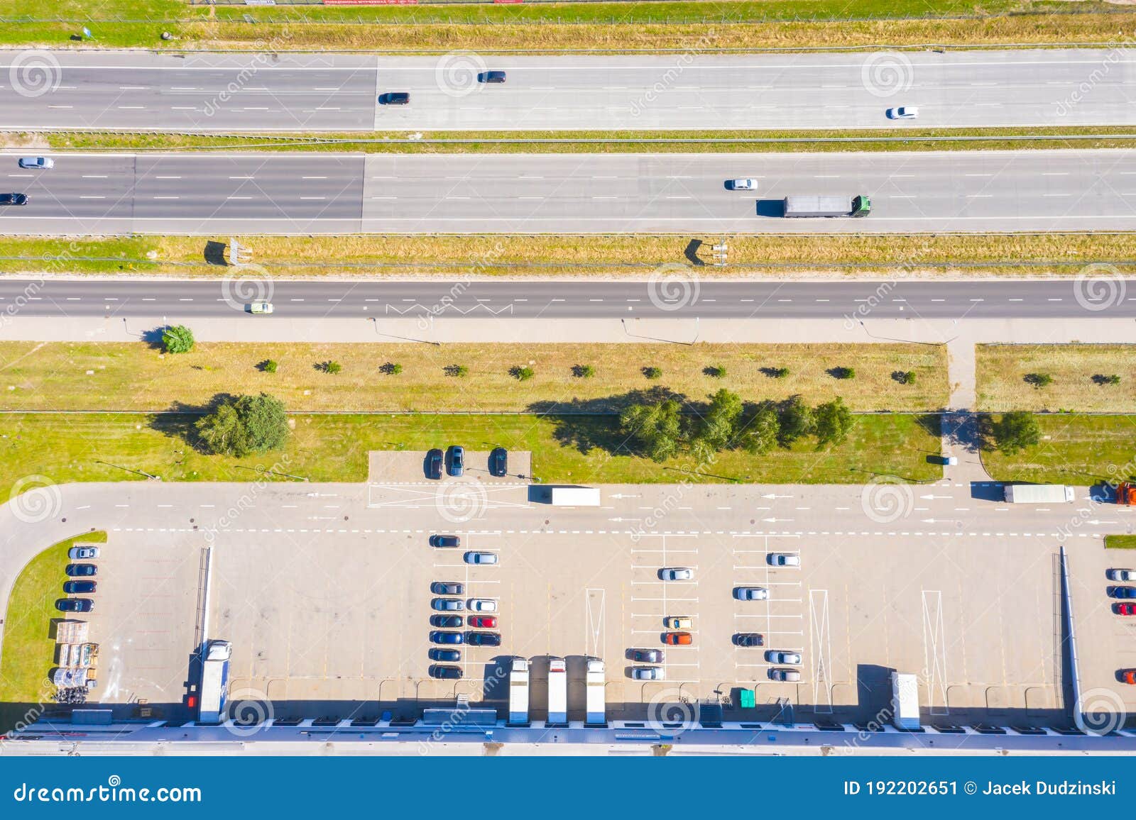 Aerial Shot of Industrial Loading Area Where Many Trucks are Unloading ...