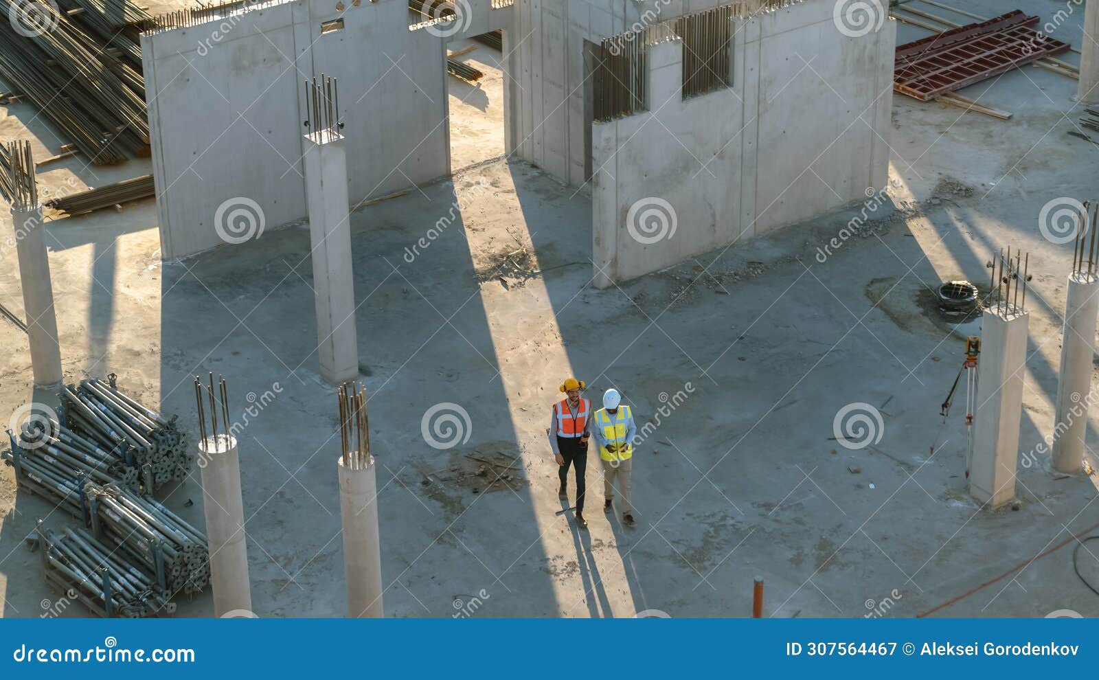 Aerial Shot of a New Constructions Development Site with Diverse Team of Engineers and ...