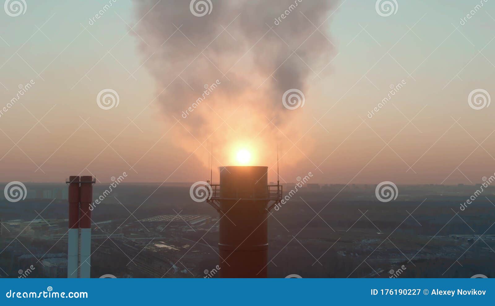 Aerial Shot Revealing Evening Sun Behind Polluting Smoke Stack Stock ...