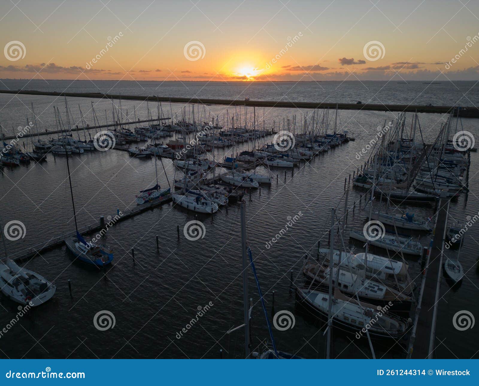 Aerial Shot of a Scenic Sunset Over the Harbor Stock Photo - Image of ...
