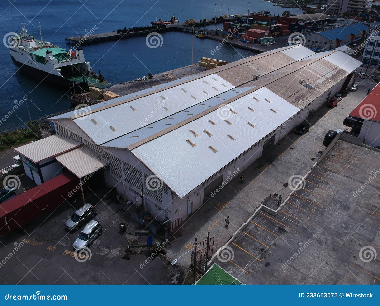 Aerial Shot of a Small Port with a Parked Ship Editorial Image - Image ...